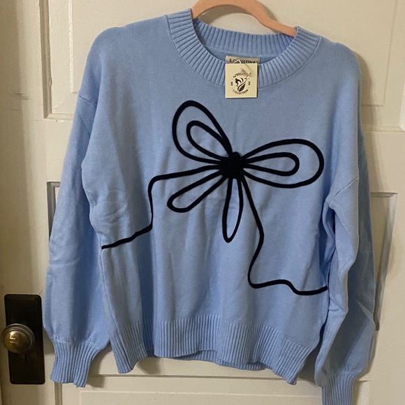 Christina | Sweaters | Christina Light Blue Sweater With Dark Blue Bow ...